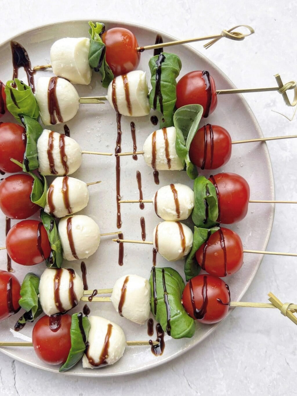 Caprese Salad Skewers with Bocconcini (Appetizer) - Nourish & Tempt