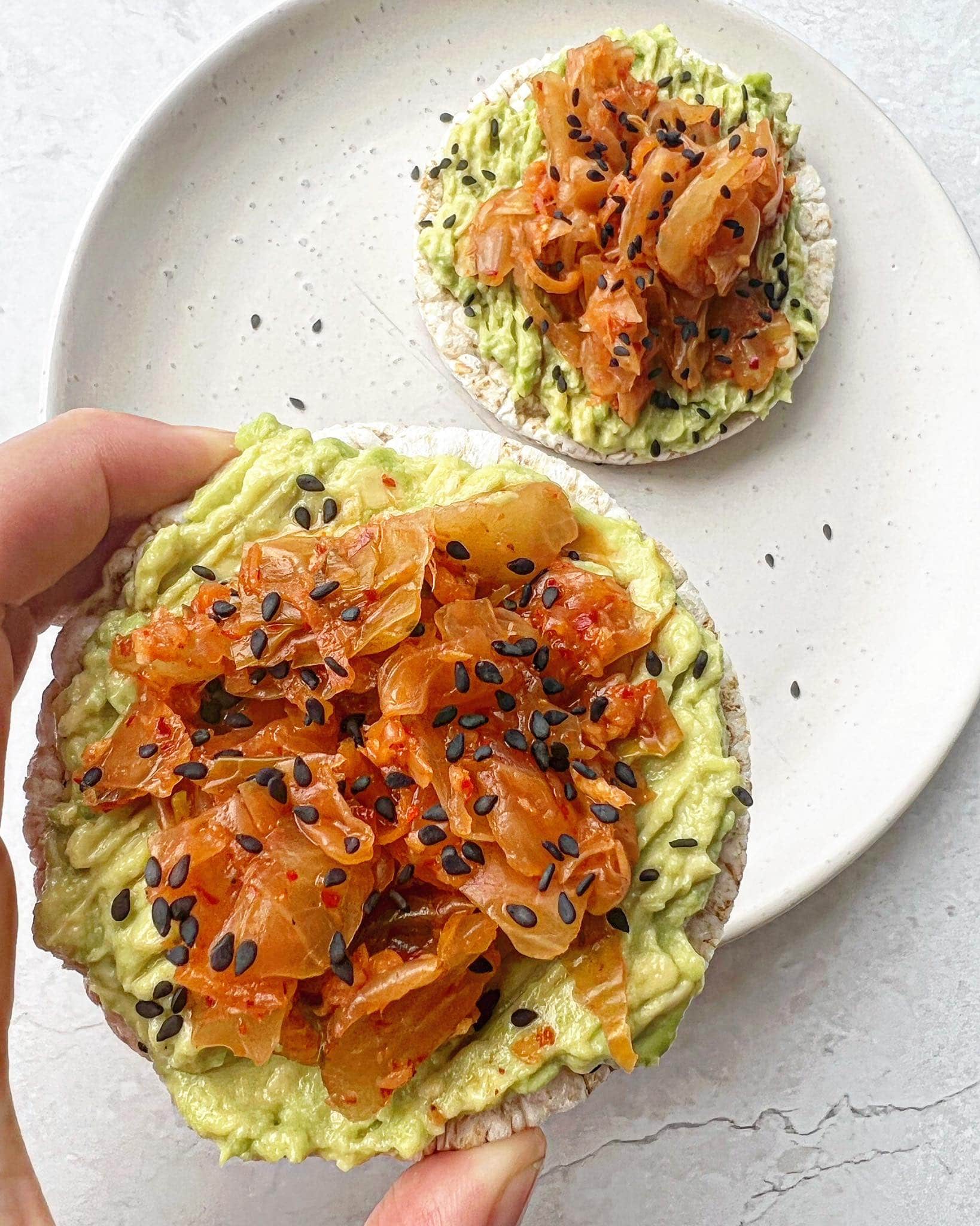 Avocado Kimchi Rice Cakes - Nourish & Tempt