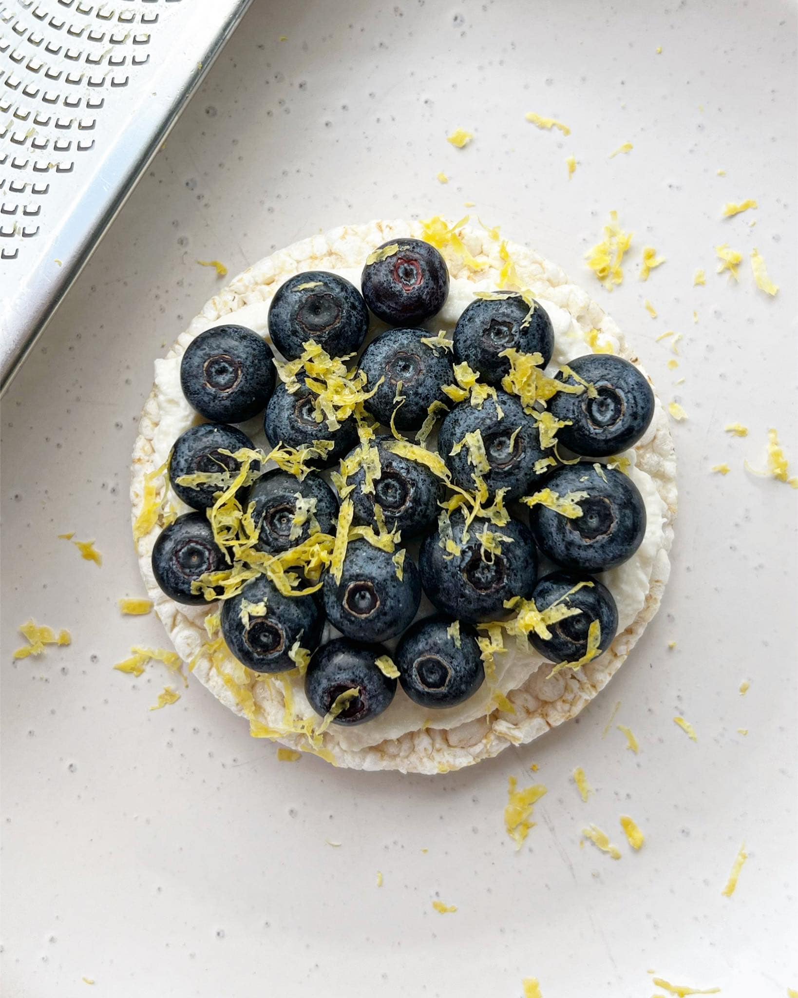 Lemony Ricotta Rice Cake with Blueberries - Nourish & Tempt